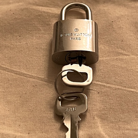 Louis Vuitton | Accessories | Authentic Silver Lv Lock 2 Keys 448 Coa ...